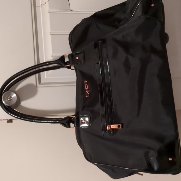 bebe | Bags | Bebe Black Overnight Bag With Pull Out Handle And Wheels ...
